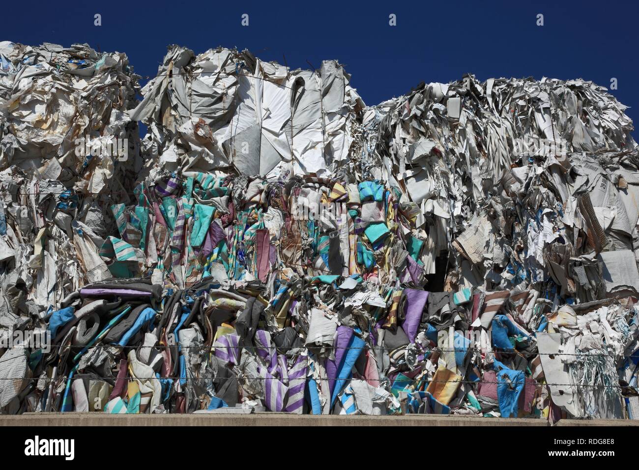Used paper, stacks of used paper at a recycling yard, paper recycling ...
