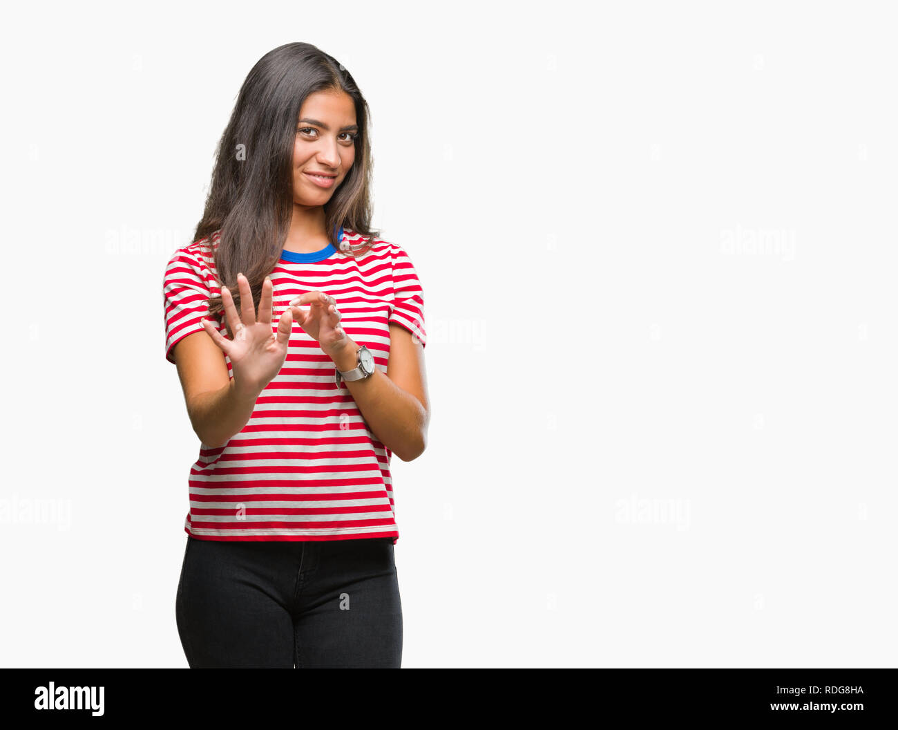 Young beautiful arab woman over isolated background disgusted ...