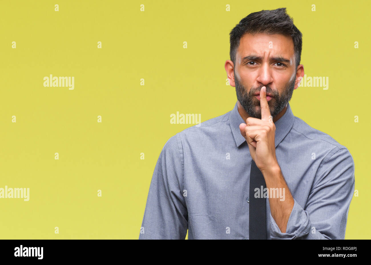 Adult hispanic business man over isolated background asking to be quiet ...