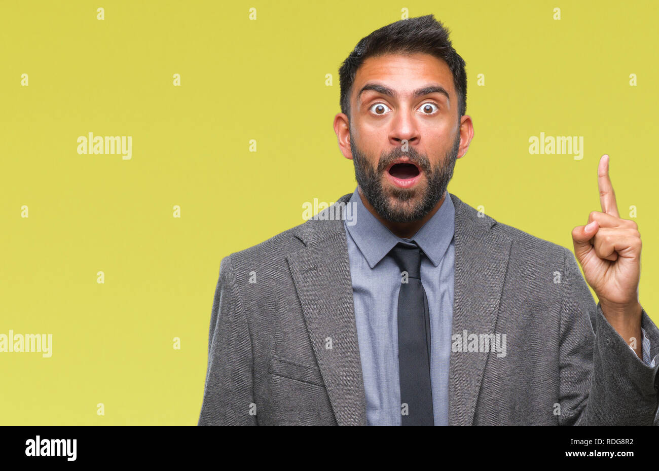 Adult hispanic business man over isolated background pointing finger up ...