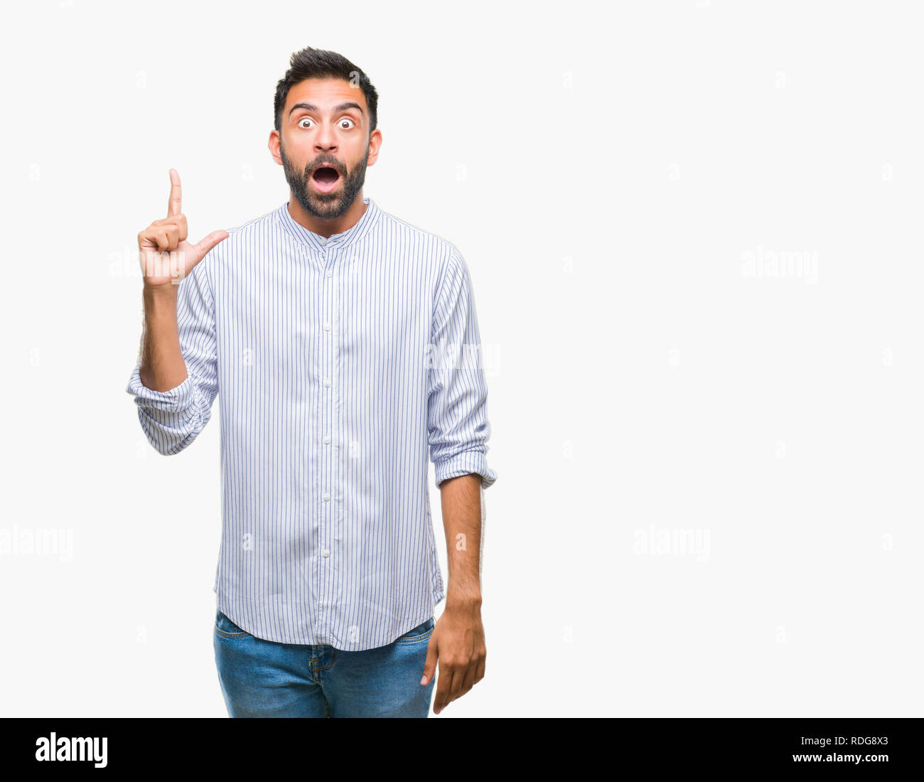 Adult hispanic man over isolated background pointing finger up with ...