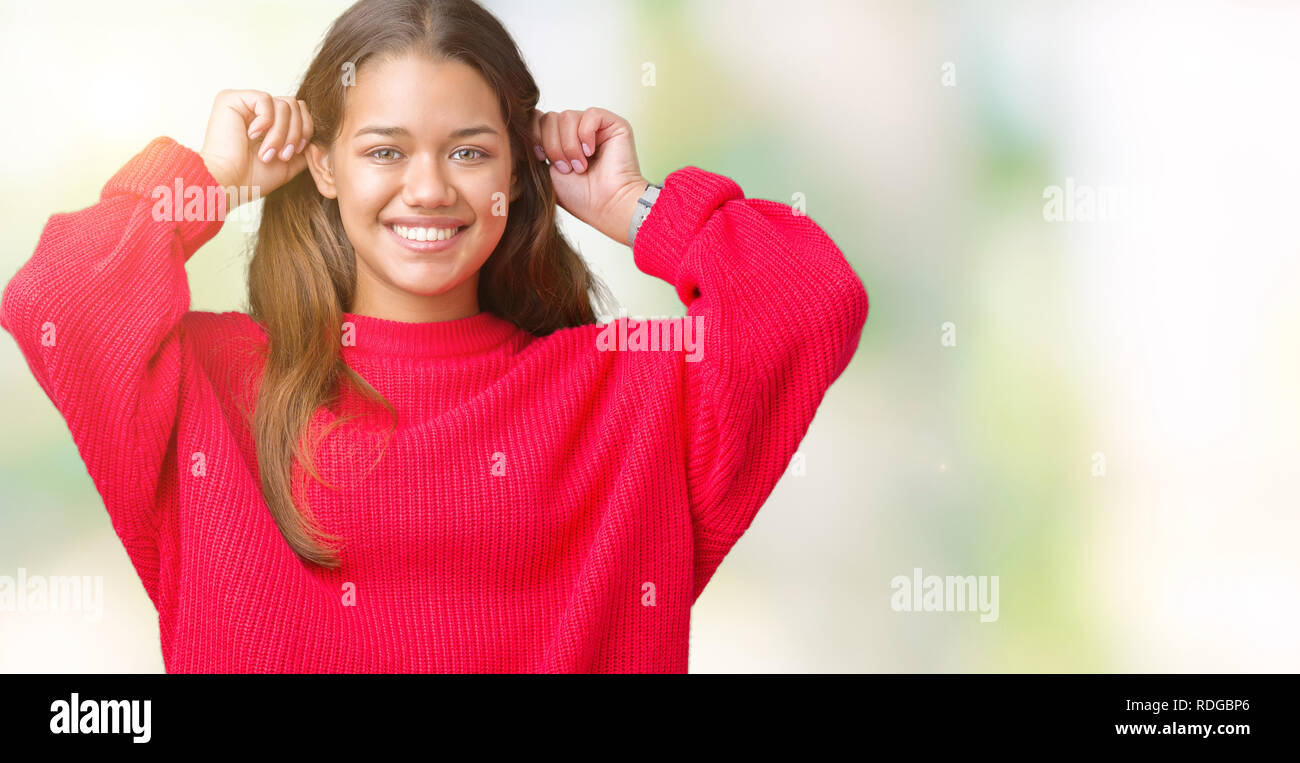 Woman pulling sweater over face hi-res stock photography and images - Alamy