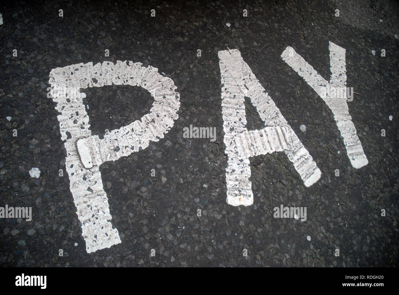 Pavement spray painted sign hi-res stock photography and images - Alamy