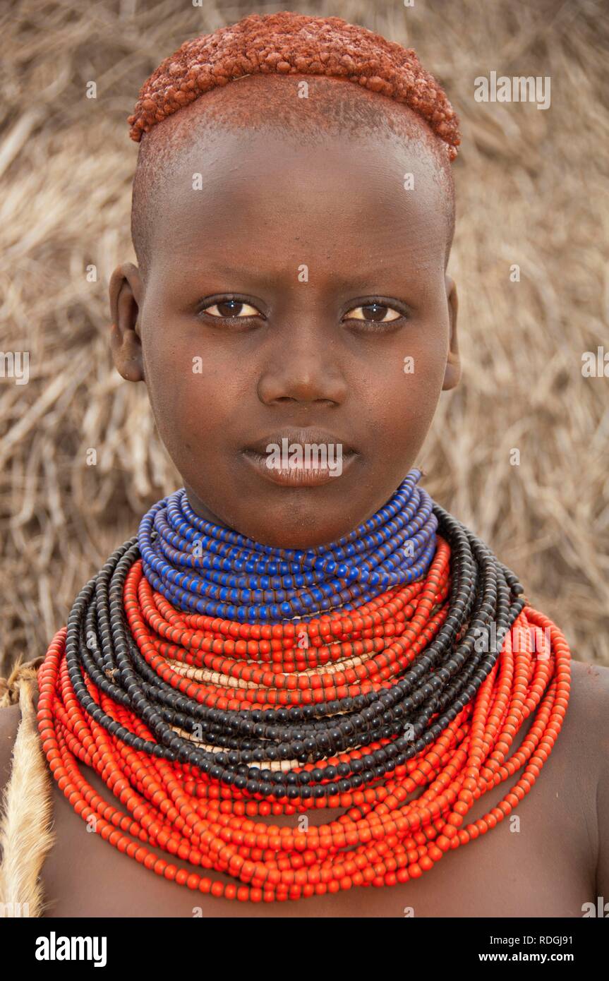 Young Karo woman with lots of colorful necklaces, portrait, Omo river ...