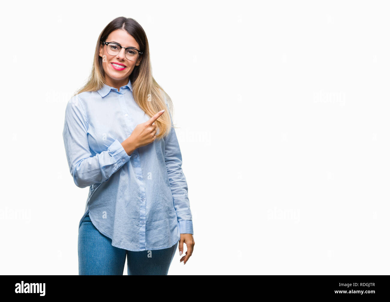 Young beautiful business woman wearing glasses over isolated background ...