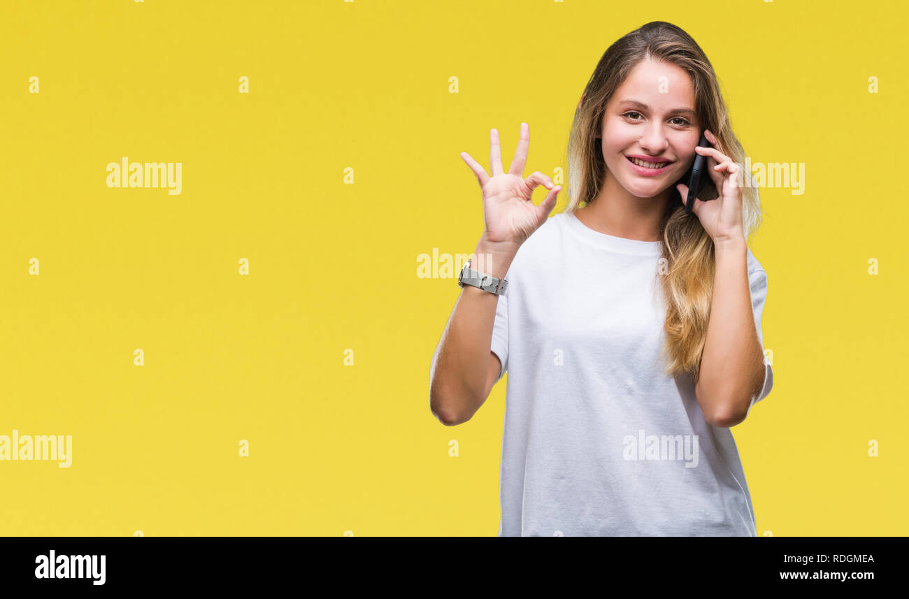 Young beautiful blonde woman calling using smartphone over isolated ...