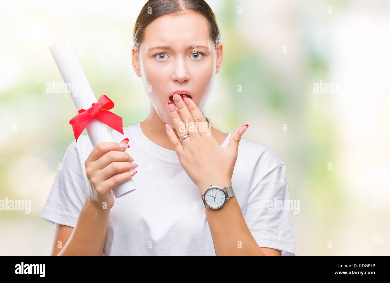 Young caucasian woman holding degree over isolated background cover ...