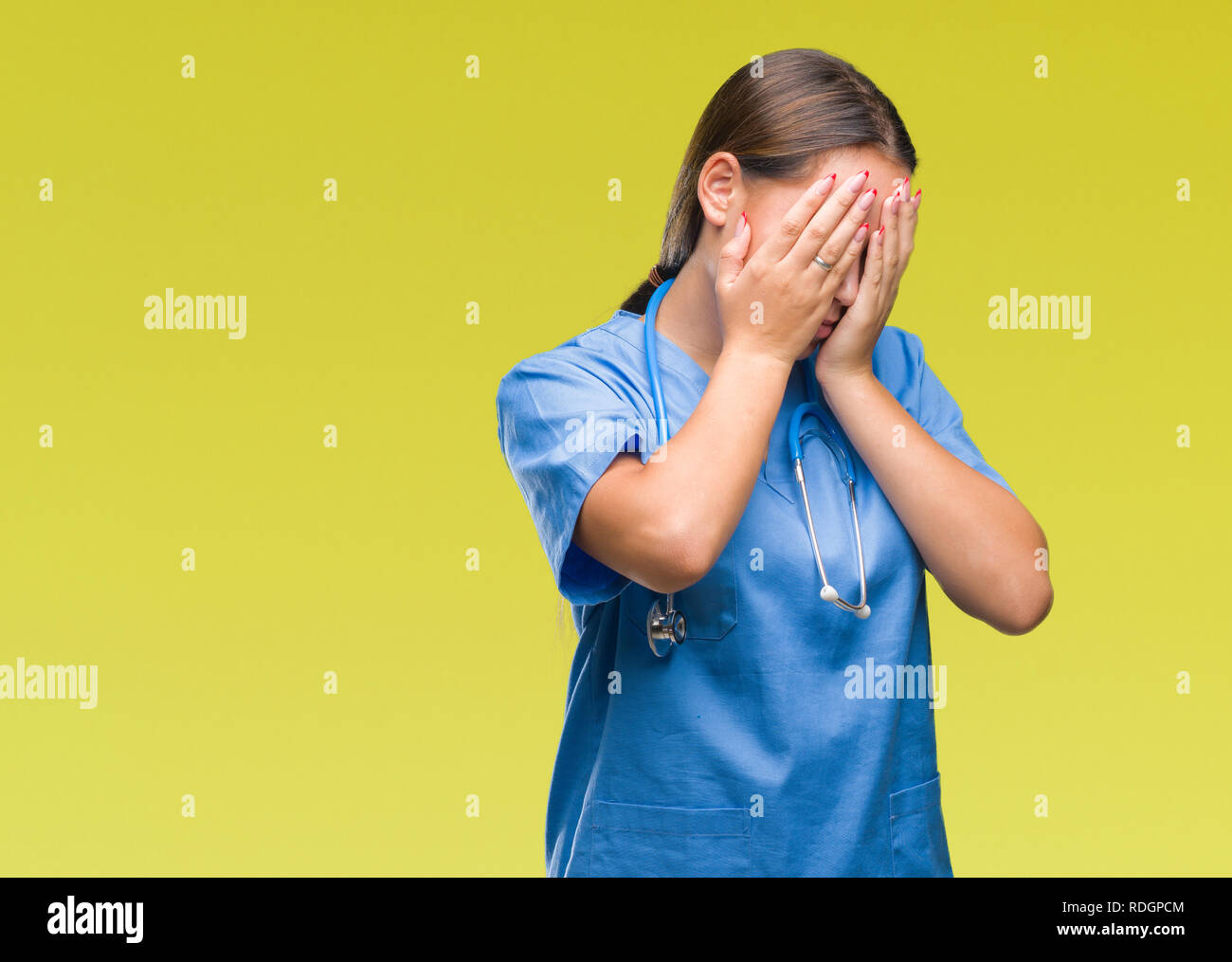 Young caucasian doctor woman wearing medical uniform over isolated ...