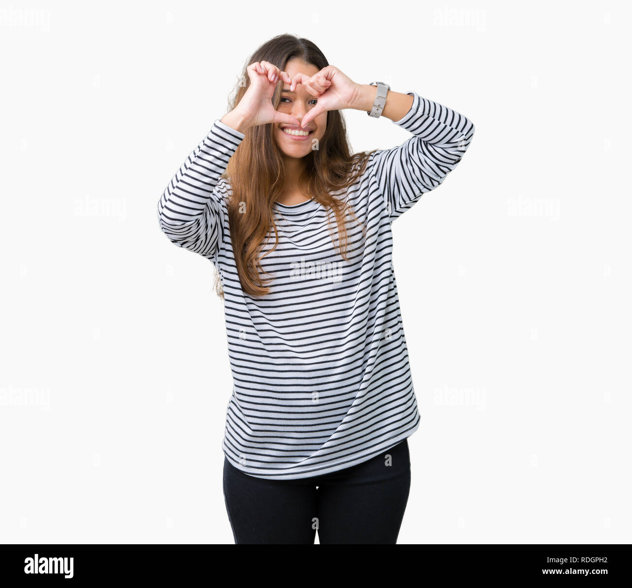 Young beautiful brunette woman wearing stripes sweater over isolated ...