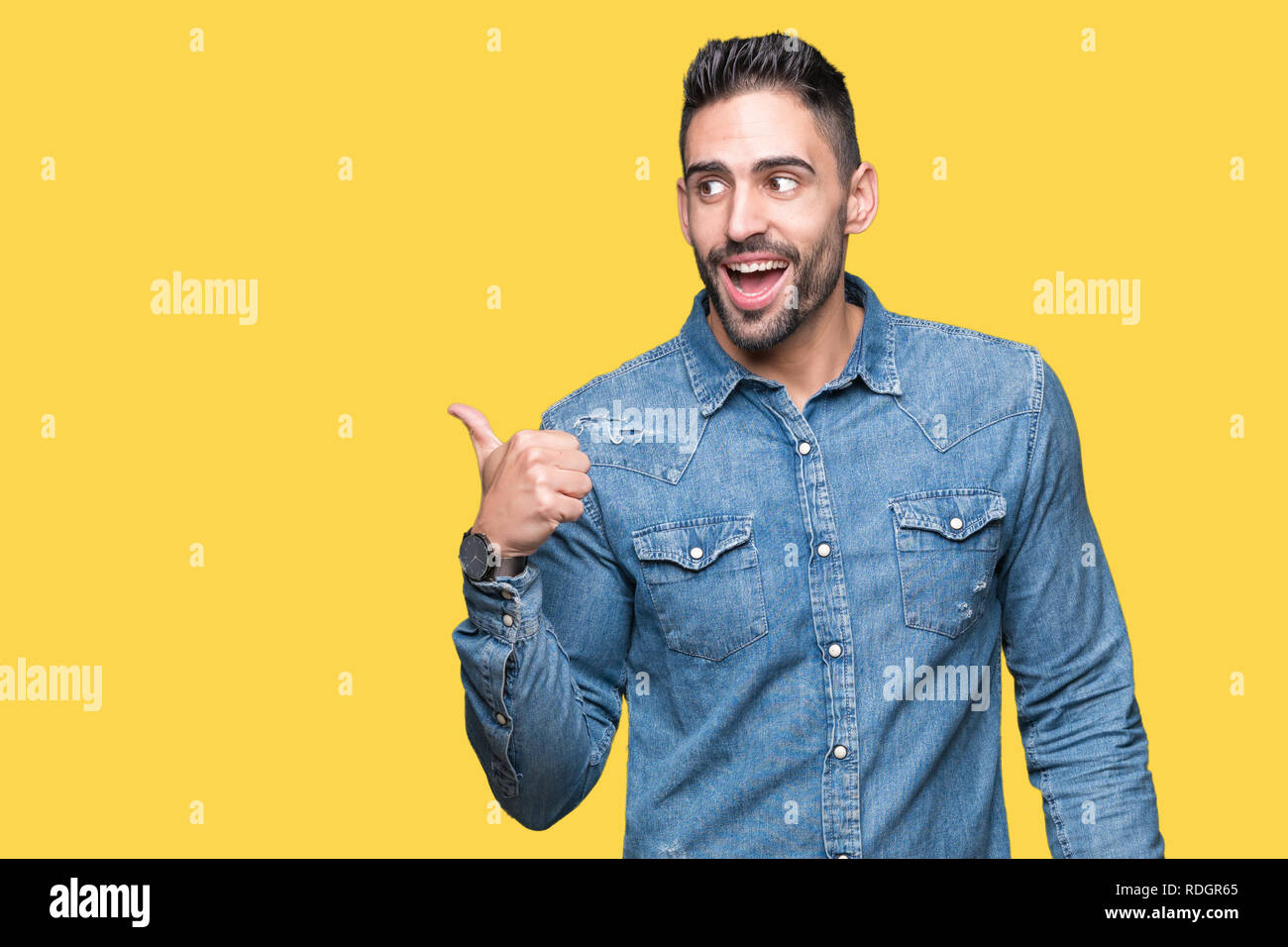 Young handsome man over isolated background smiling with happy face ...