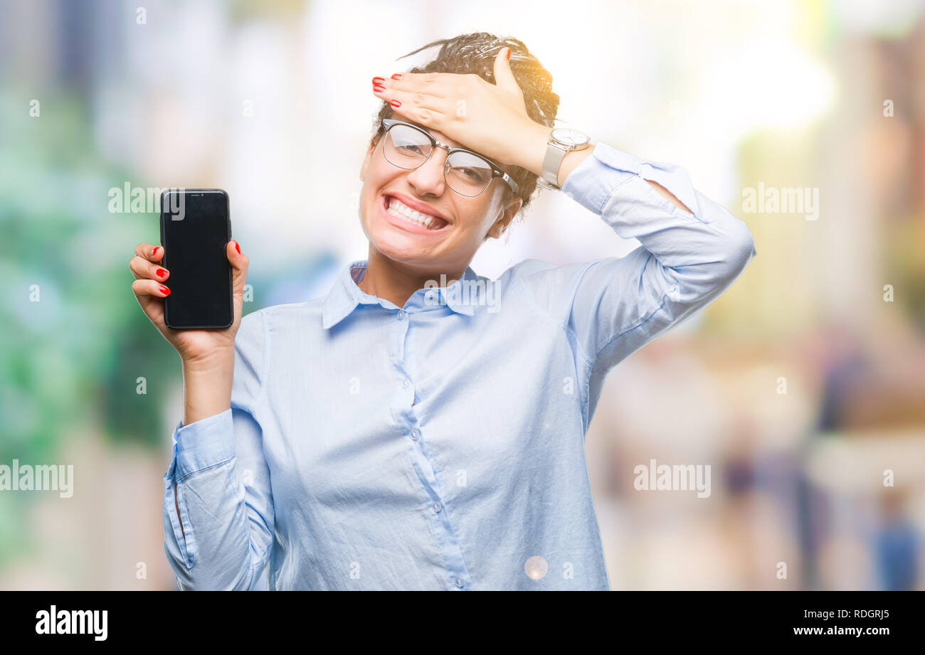 Young braided hair african american business girl showing screen of ...