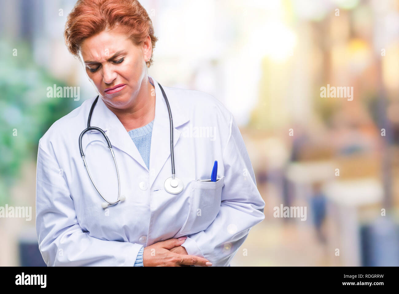 Senior caucasian doctor woman wearing medical uniform over isolated ...
