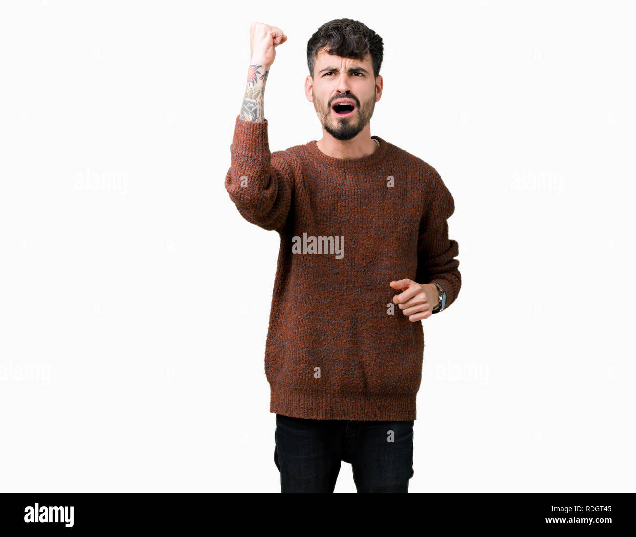 Young handsome man wearing winter sweater over isolated background ...
