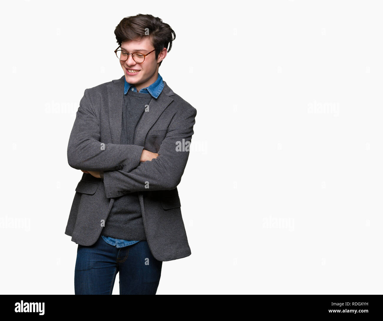 Young handsome business man wearing glasses over isolated background ...