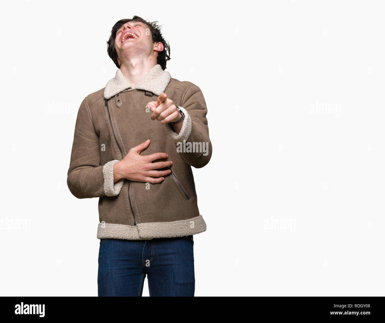 Young handsome man wearing winter coat over isolated background ...