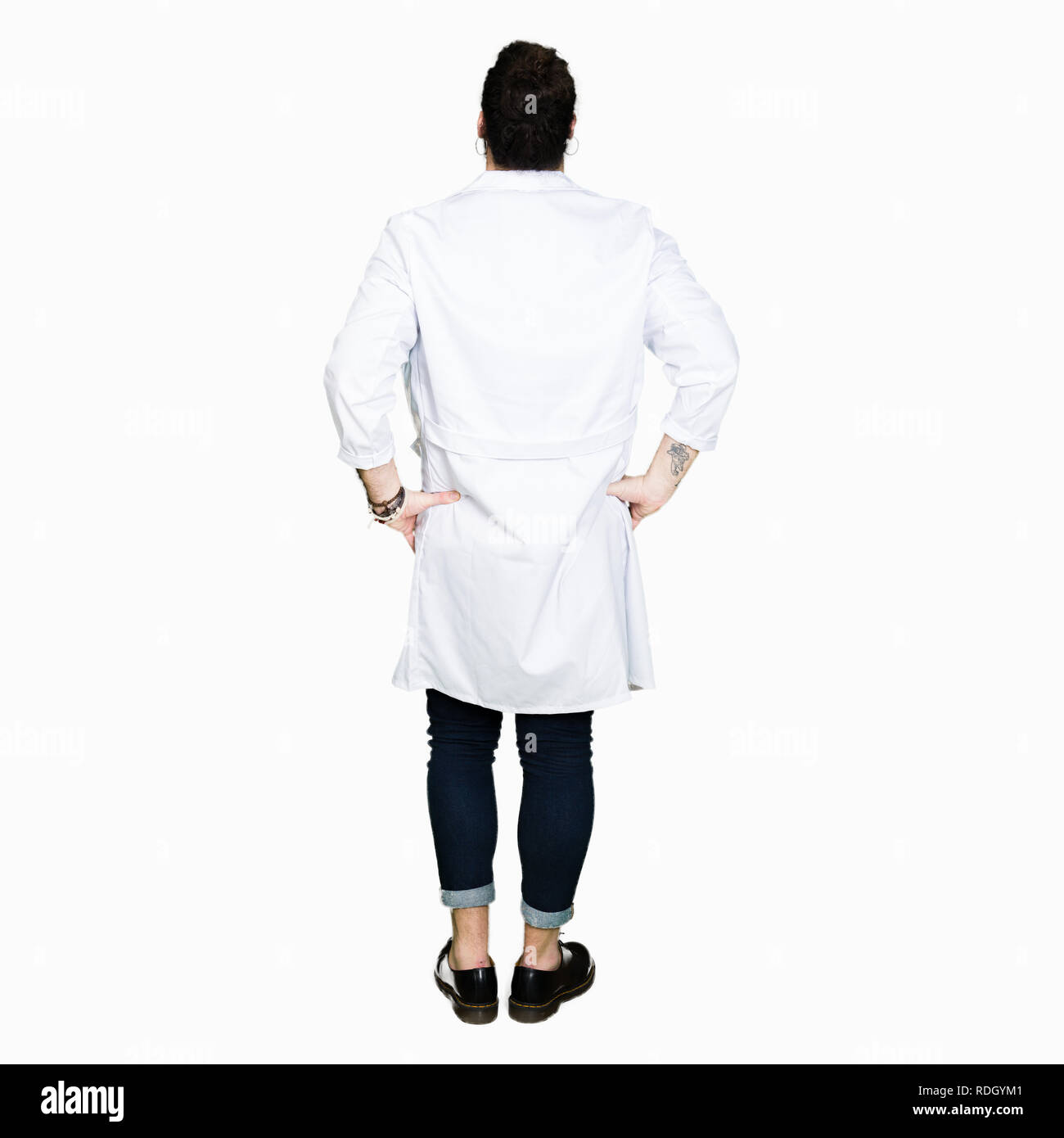Doctor with long hair wearing medical coat and stethoscope standing ...