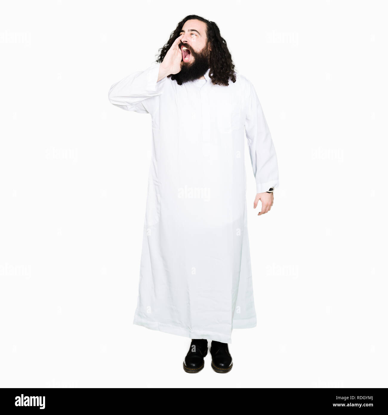 Man wearing Jesus Christ costume shouting and screaming loud to side ...