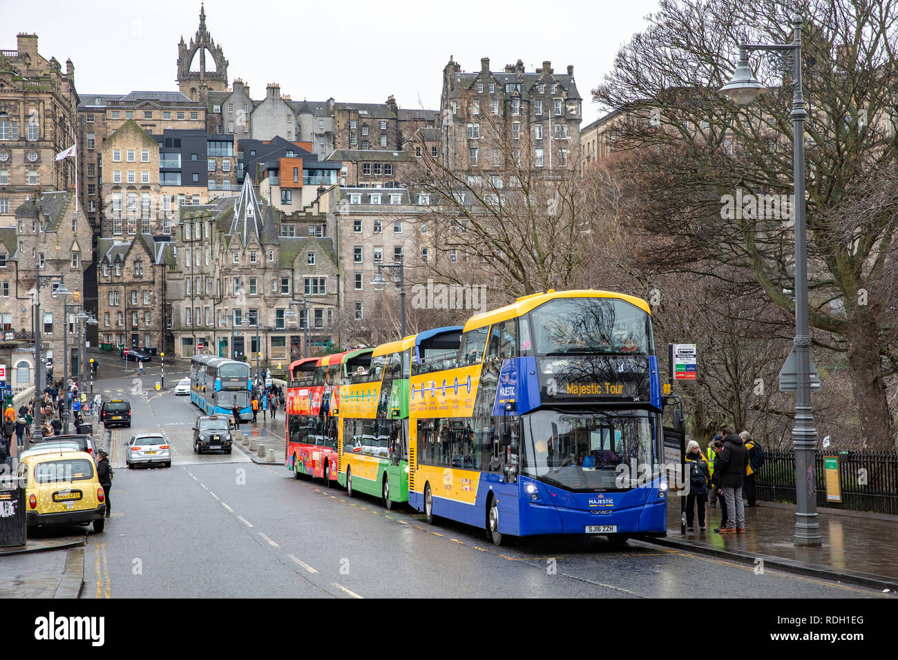 Sightseeing tour buses in Edinburgh city centre,Scotland,Uk Stock Photo ...