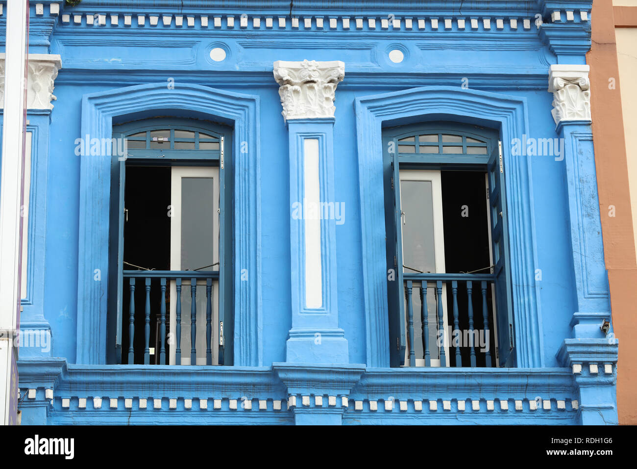 Colourful blue painted house in Chinatown Singapore, one of the many ...