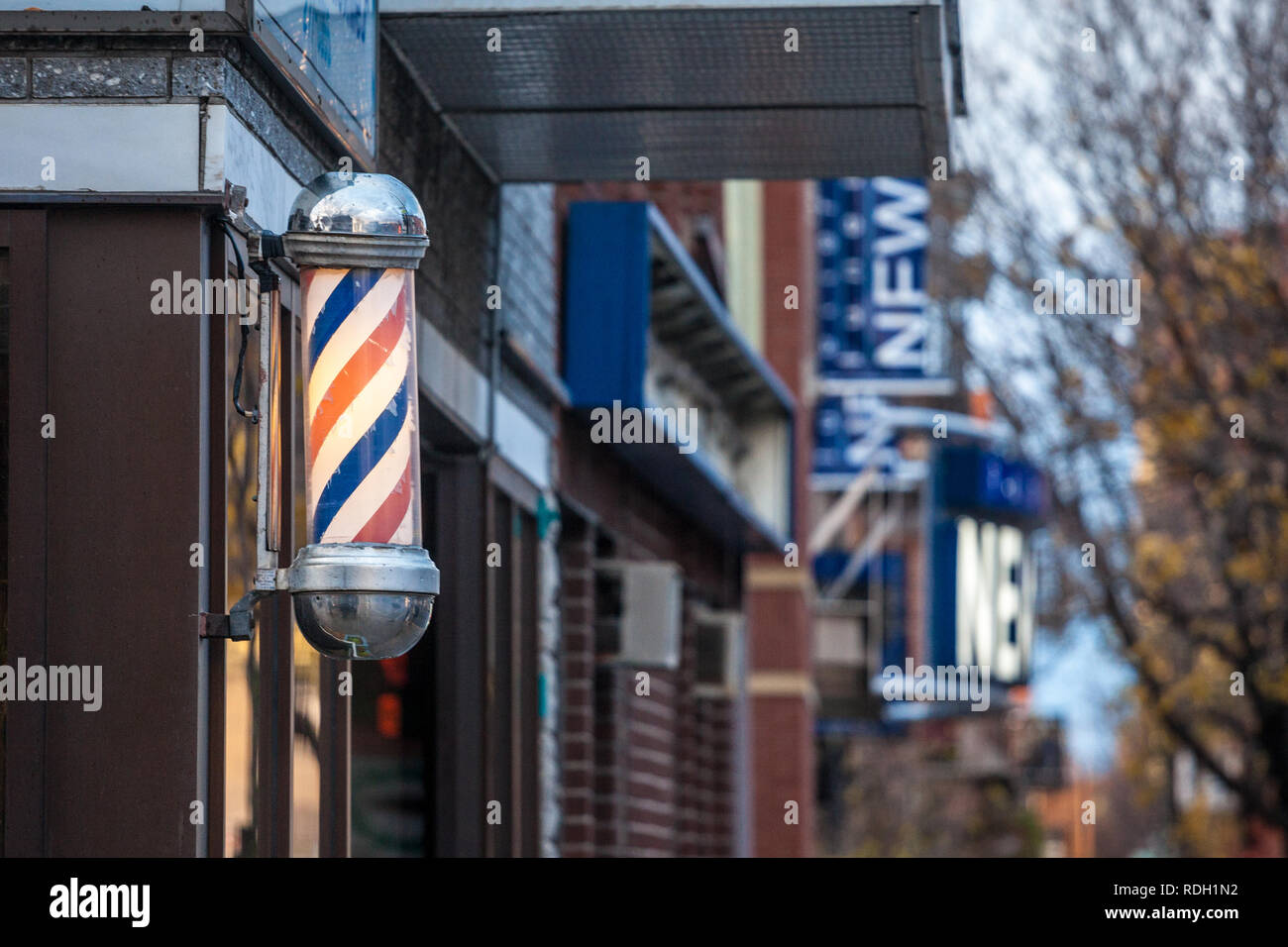 MONTREAL, CANADA - NOVEMBER 6, 2018: Typical American barbers pole seen ...
