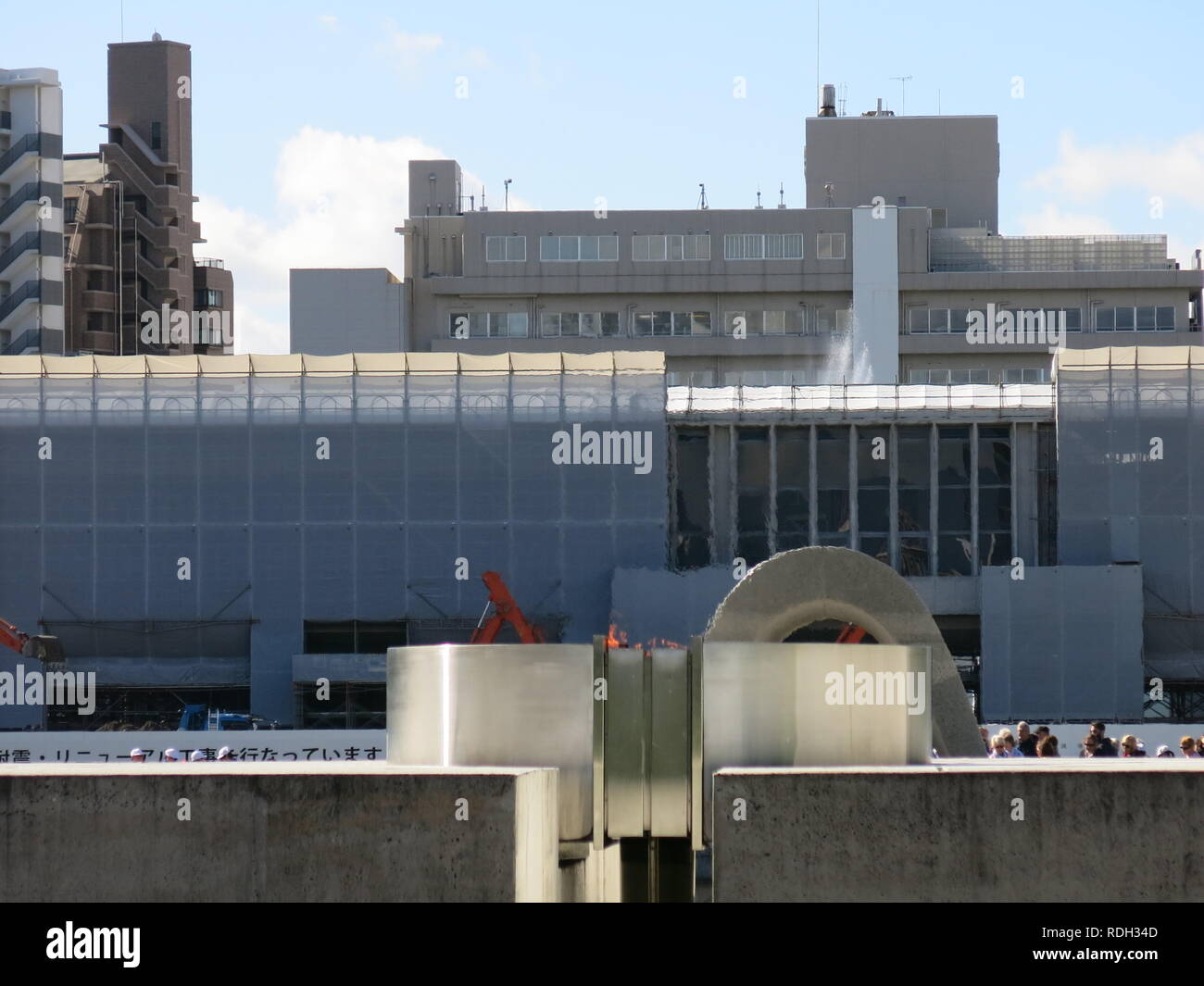 View of the saddle-shaped monument and Peace Flame at the Memorial ...