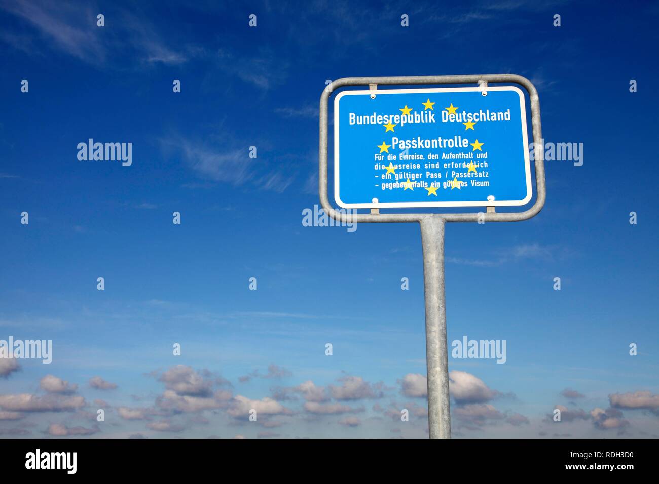 German border sign in the port of Spiekeroog island, one of the East ...