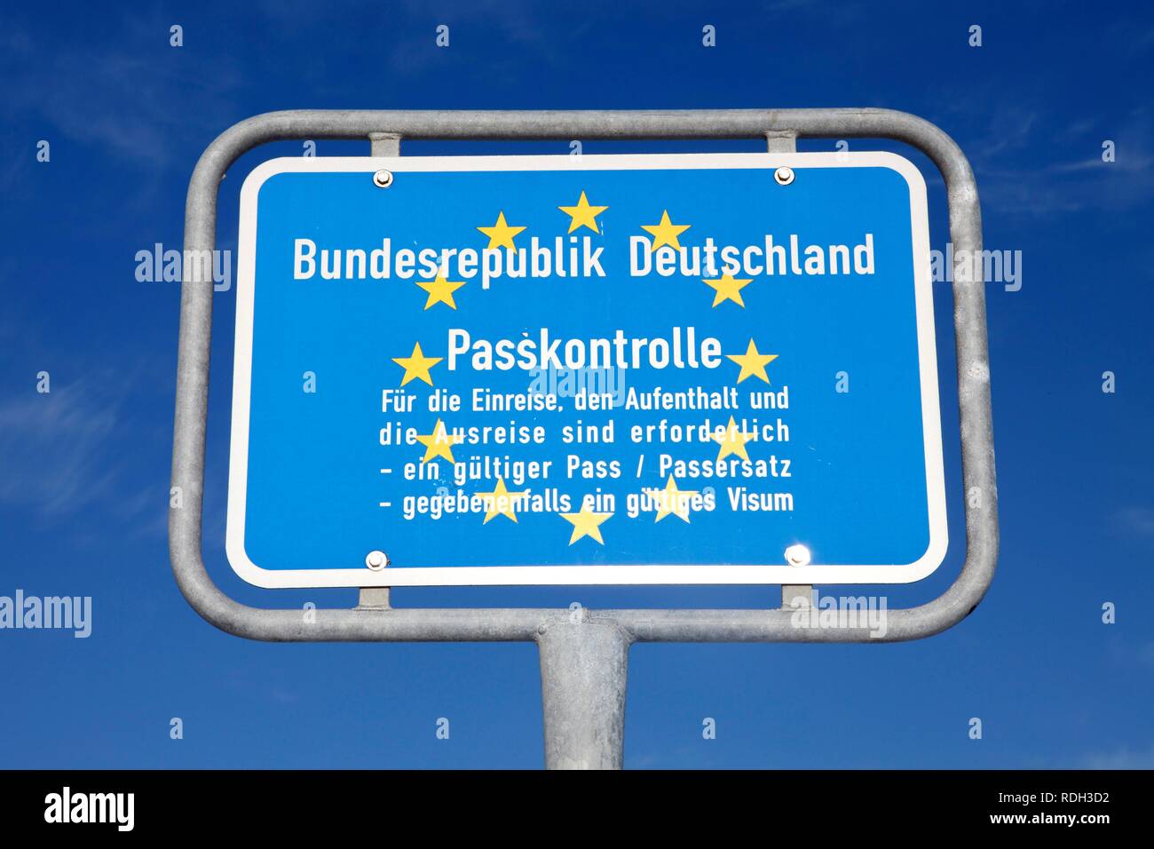 German border sign in the port of Spiekeroog island, one of the East ...