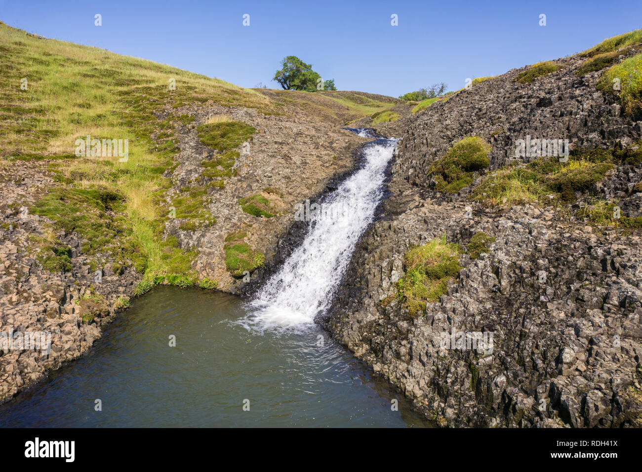 Small waterfall dropping into a pool, North Table Mountain Ecological ...