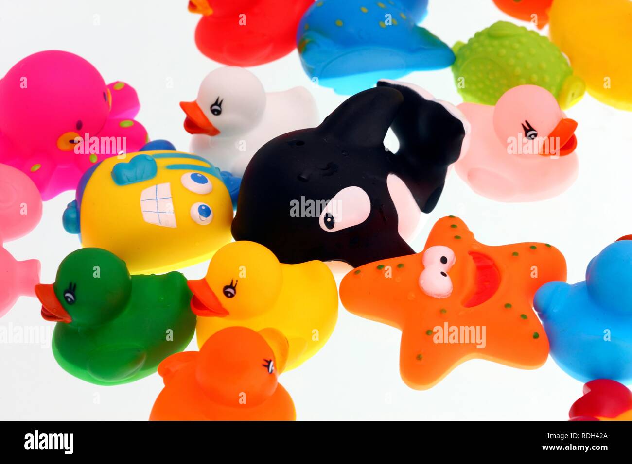 Various colourful water toys Stock Photo - Alamy