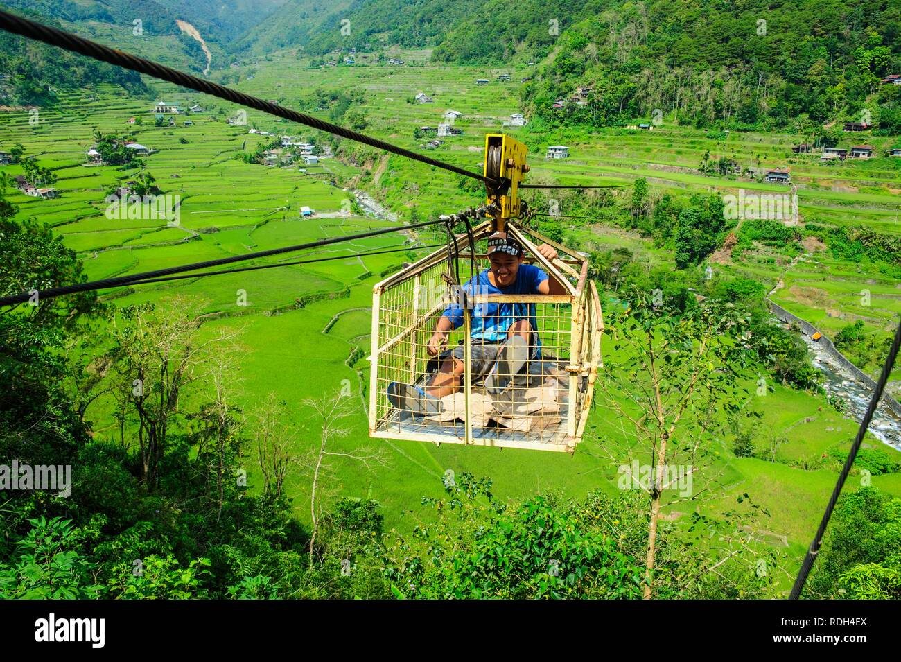 Cargo seat above Hapao rice terraces, part of the world heritage sight ...