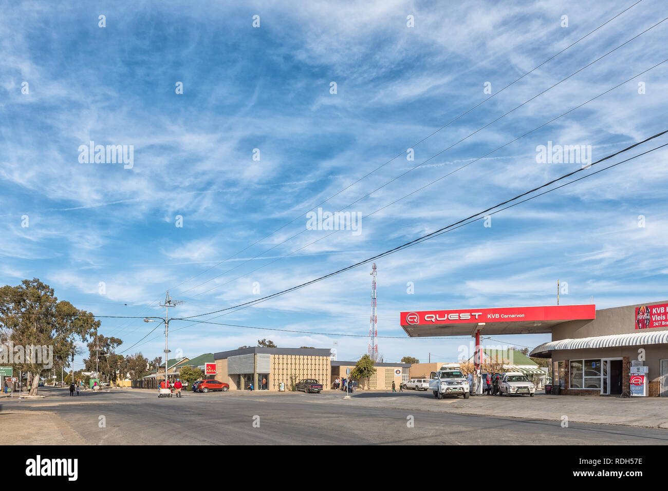 CARNAVON, SOUTH AFRICA, AUGUST 31, 2018: A street scene, with vehicles ...