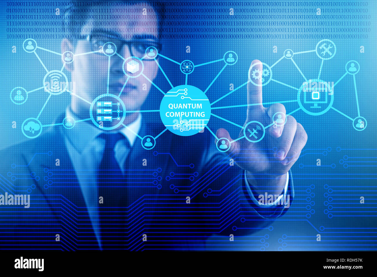 Businessman pressing virtual button in quantum computing concept Stock Photo - Alamy
