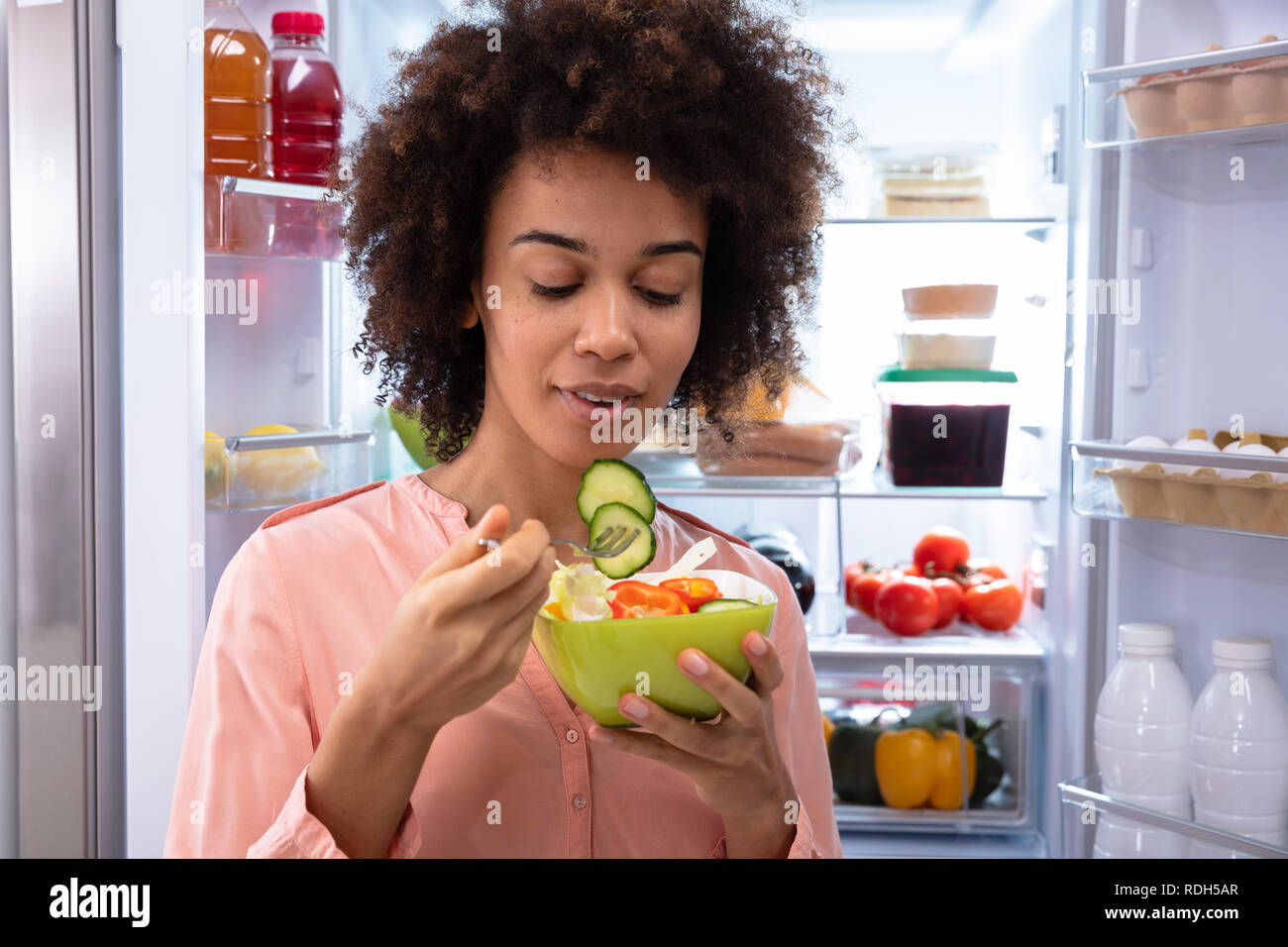 African eating hi-res stock photography and images - Alamy