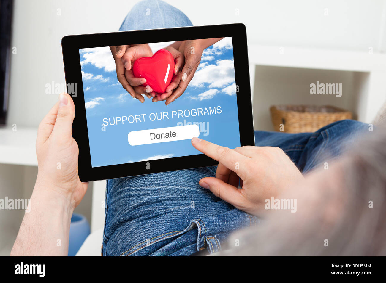 Child using a tablet hi-res stock photography and images - Alamy