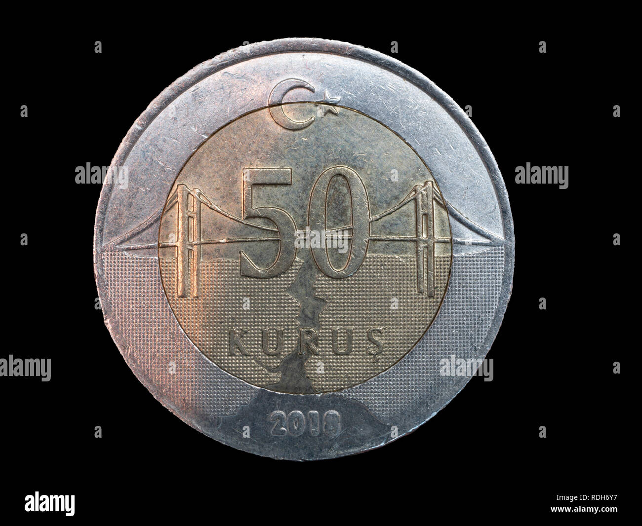 macro closeup of front side one turkish coin fifty kurus money on black ...