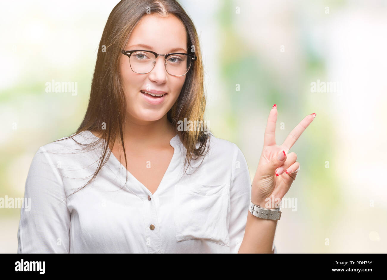 Young caucasian beautiful business woman wearing glasses over isolated ...