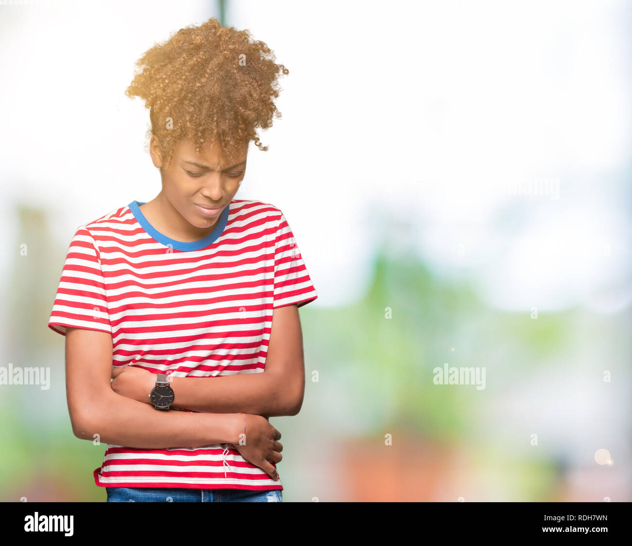 Beautiful young african american woman over isolated background with ...