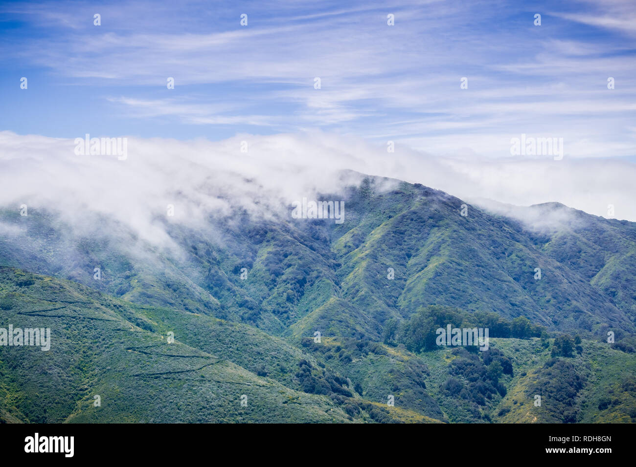 Fog covering Montara mountain (McNee Ranch State Park) landscape ...