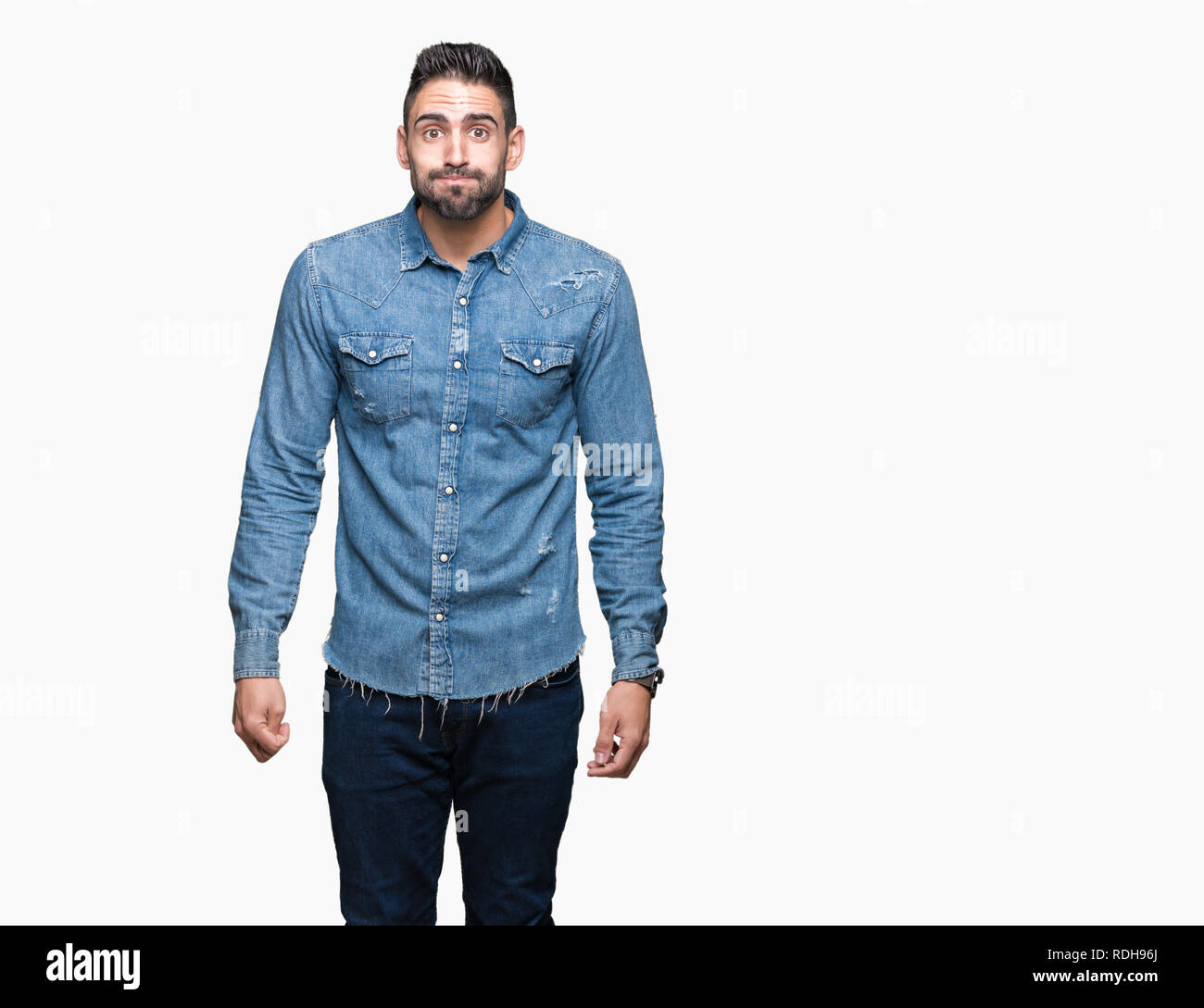 Young handsome man over isolated background puffing cheeks with funny ...