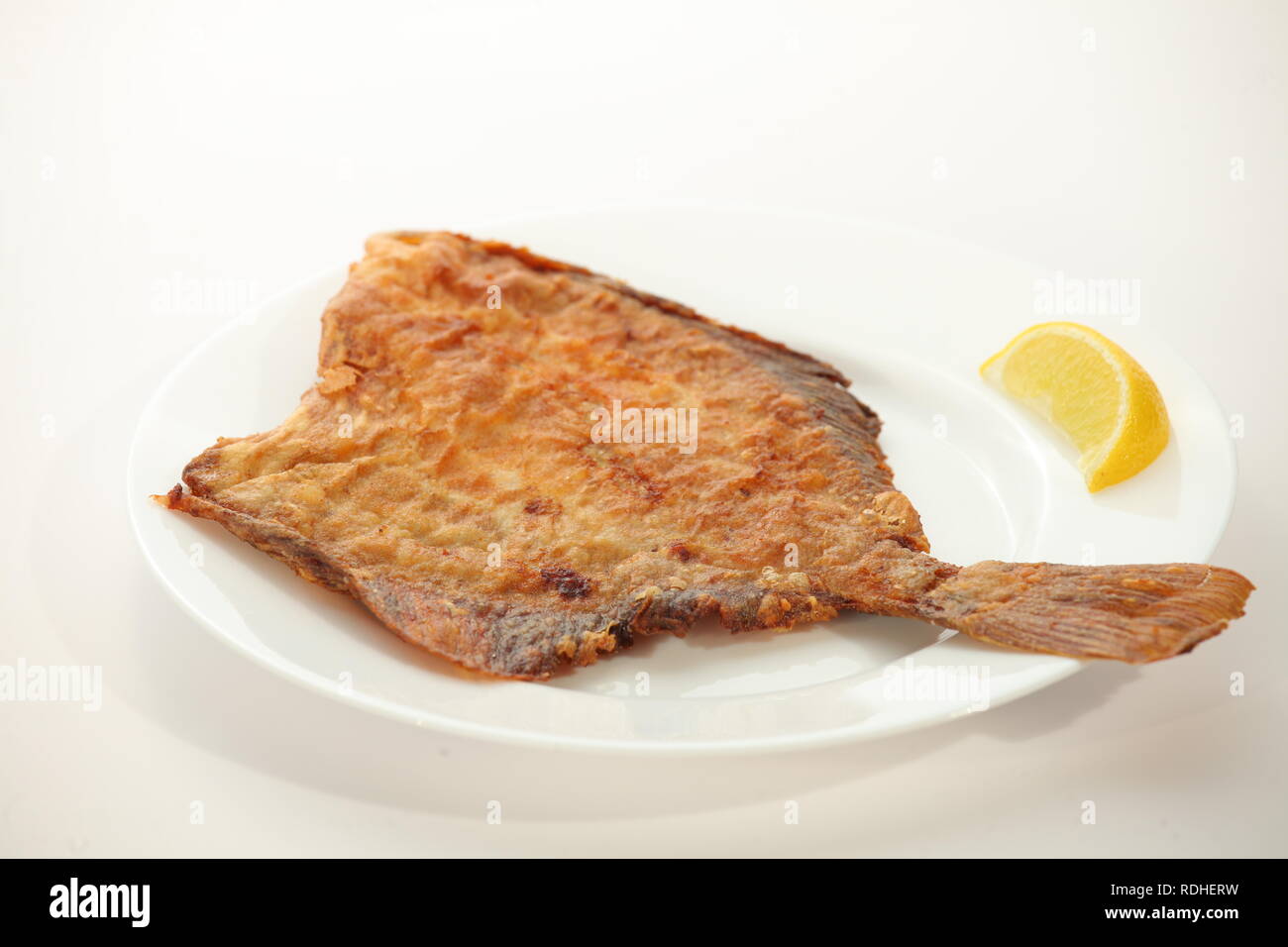 Fish baked flounder cooked hi-res stock photography and images - Alamy
