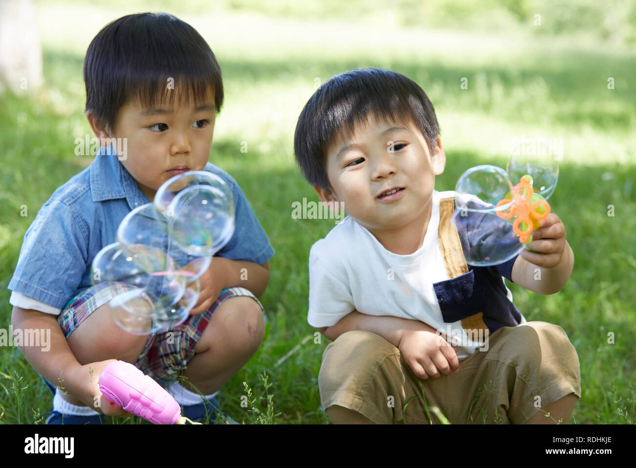 Japanese kids in a city park Stock Photo - Alamy