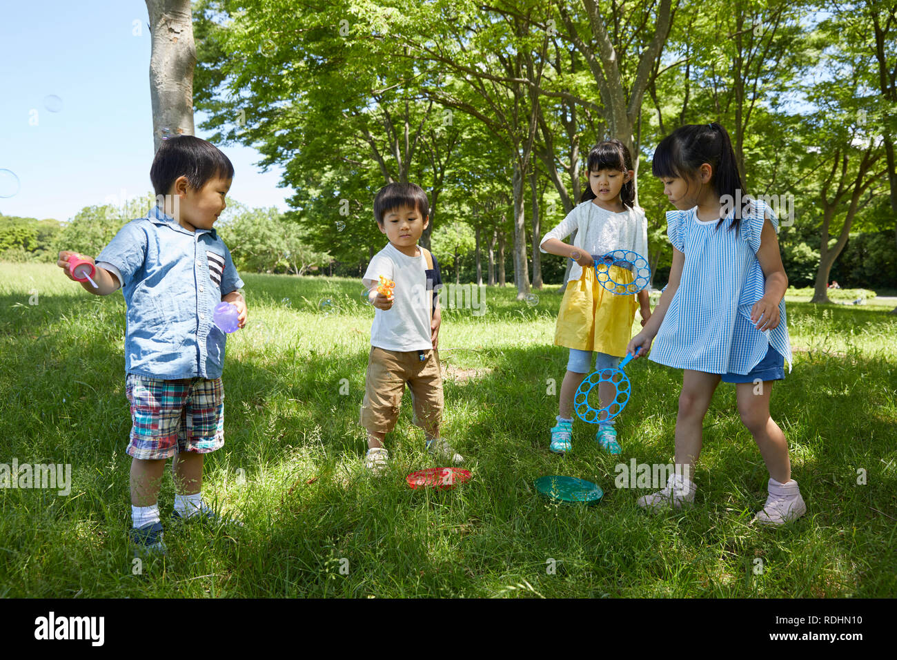 Japanese kids in a city park Stock Photo - Alamy