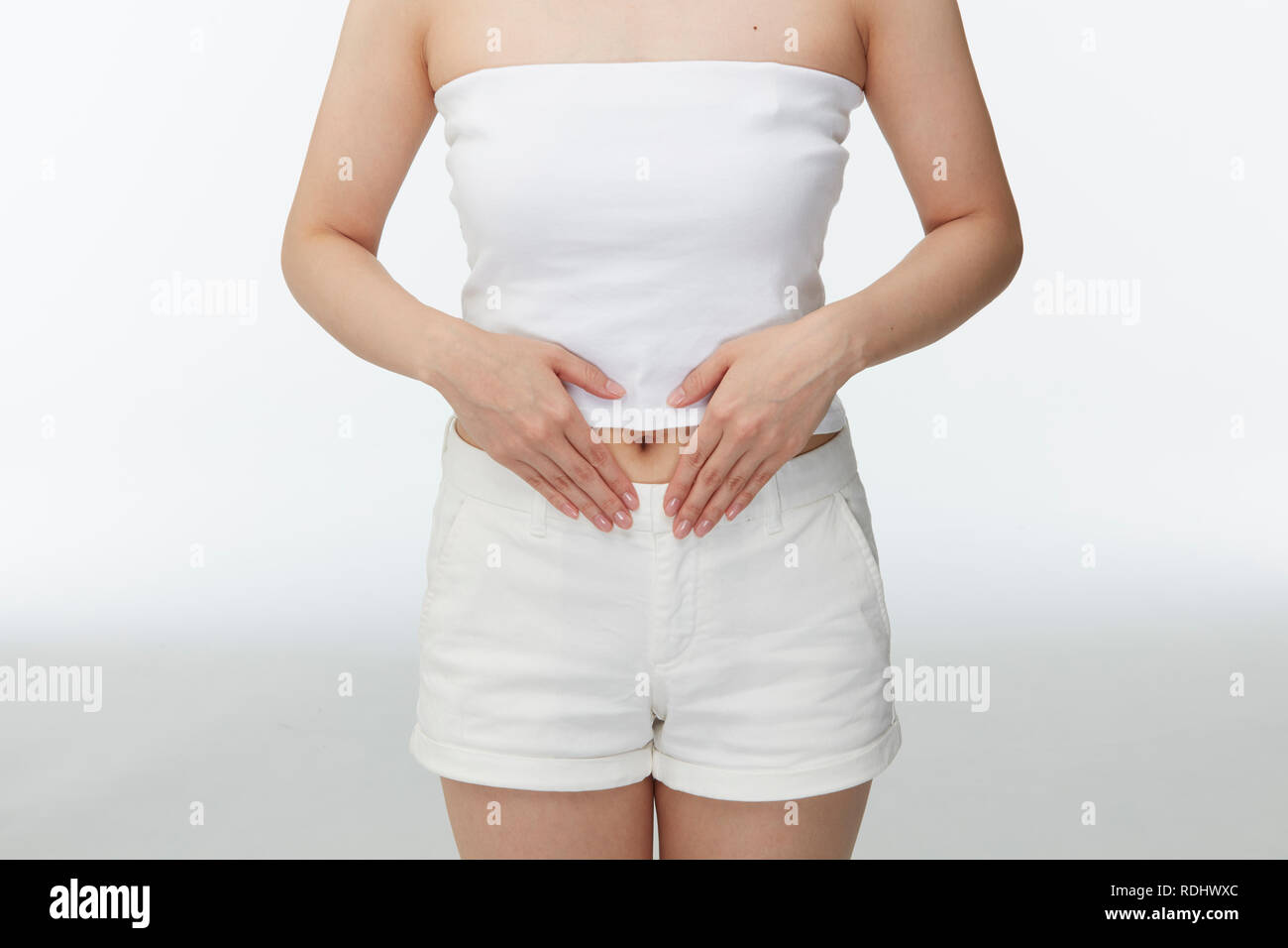 Japanese model body in white outfit Stock Photo - Alamy