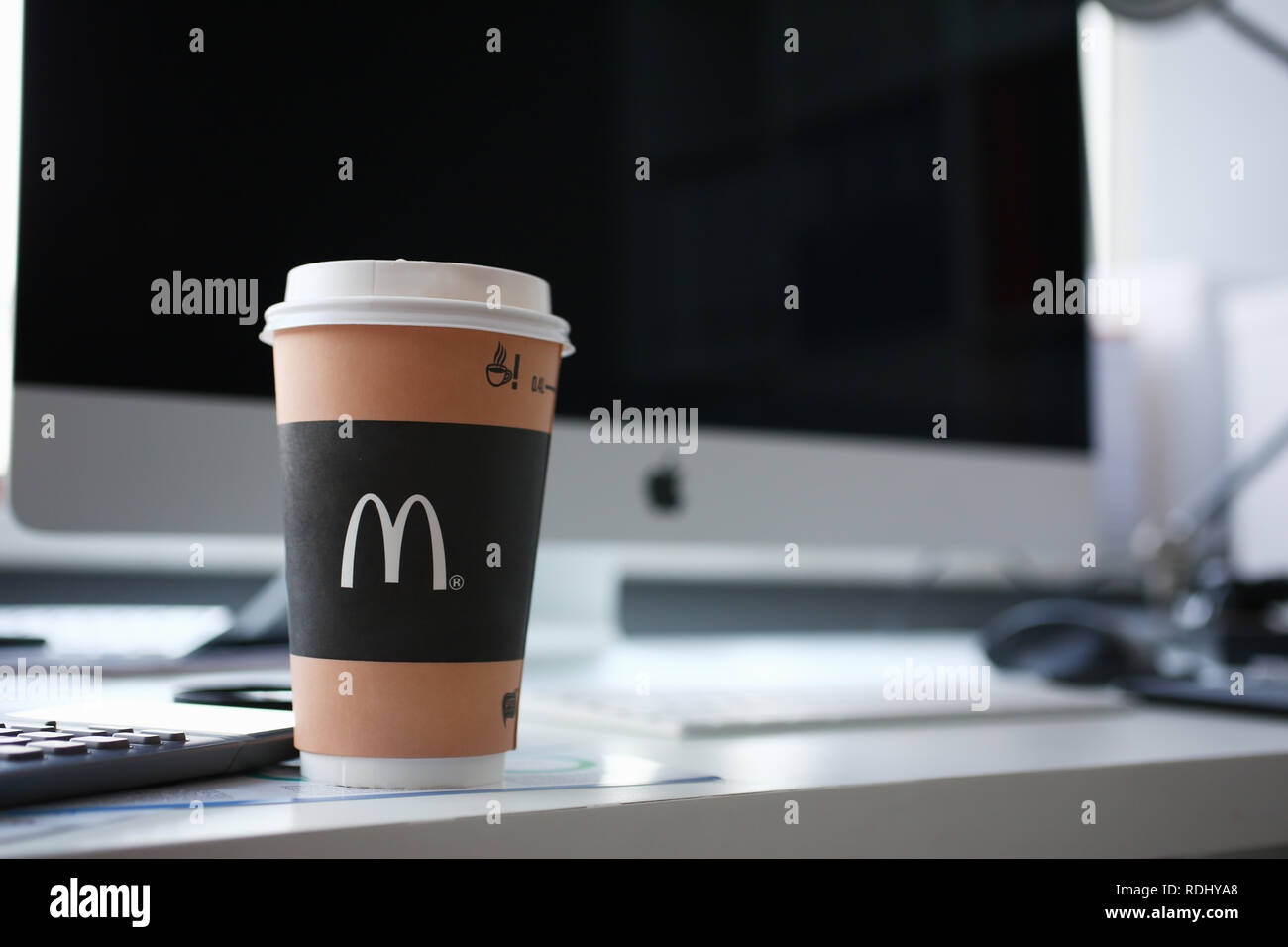 Coffee in a paper cup of mcdonalds Stock Photo - Alamy