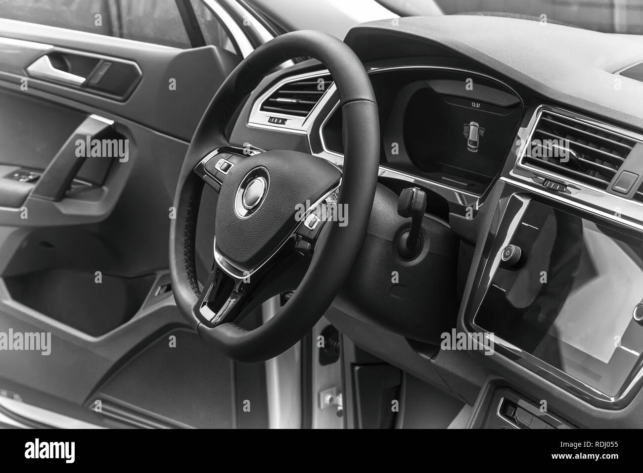Interior of the car interior with steering wheel and control devices ...