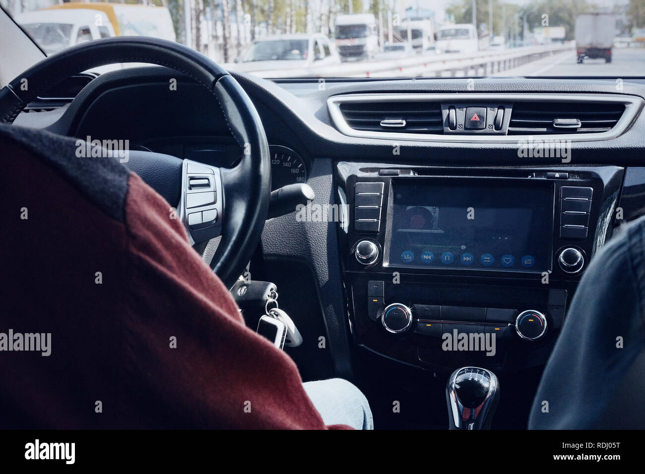 Interior of the car interior with steering wheel and control devices ...