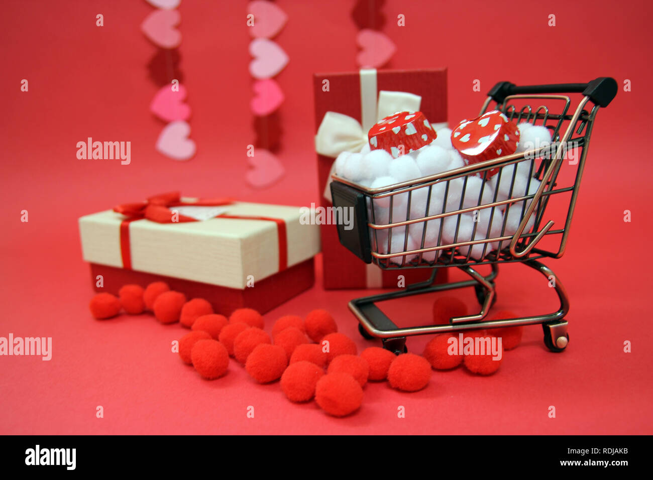 Gift box with red theme Stock Photo - Alamy
