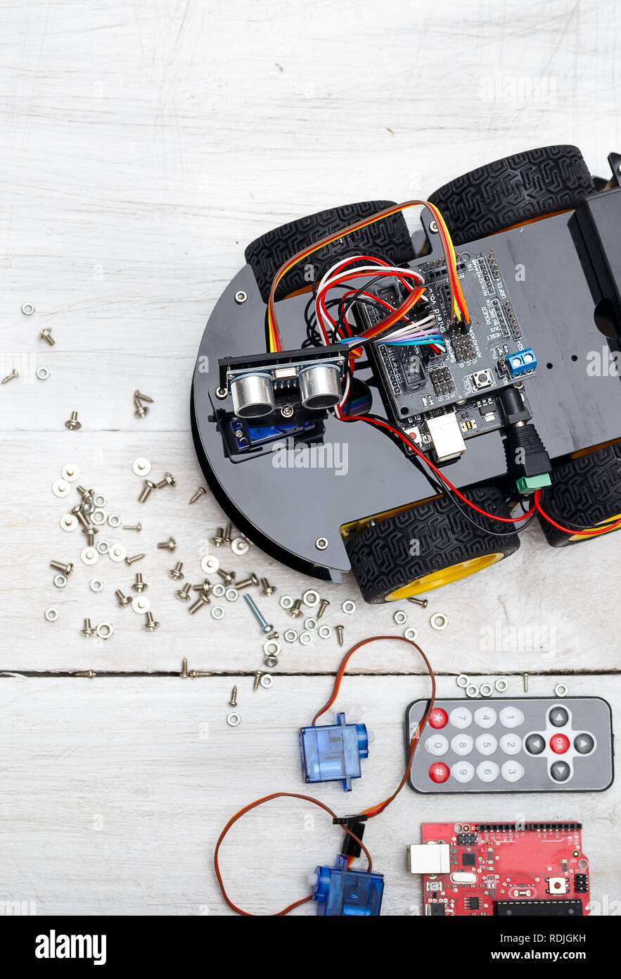 robot and different necessary parts to build a robot. Vertical Photo ...