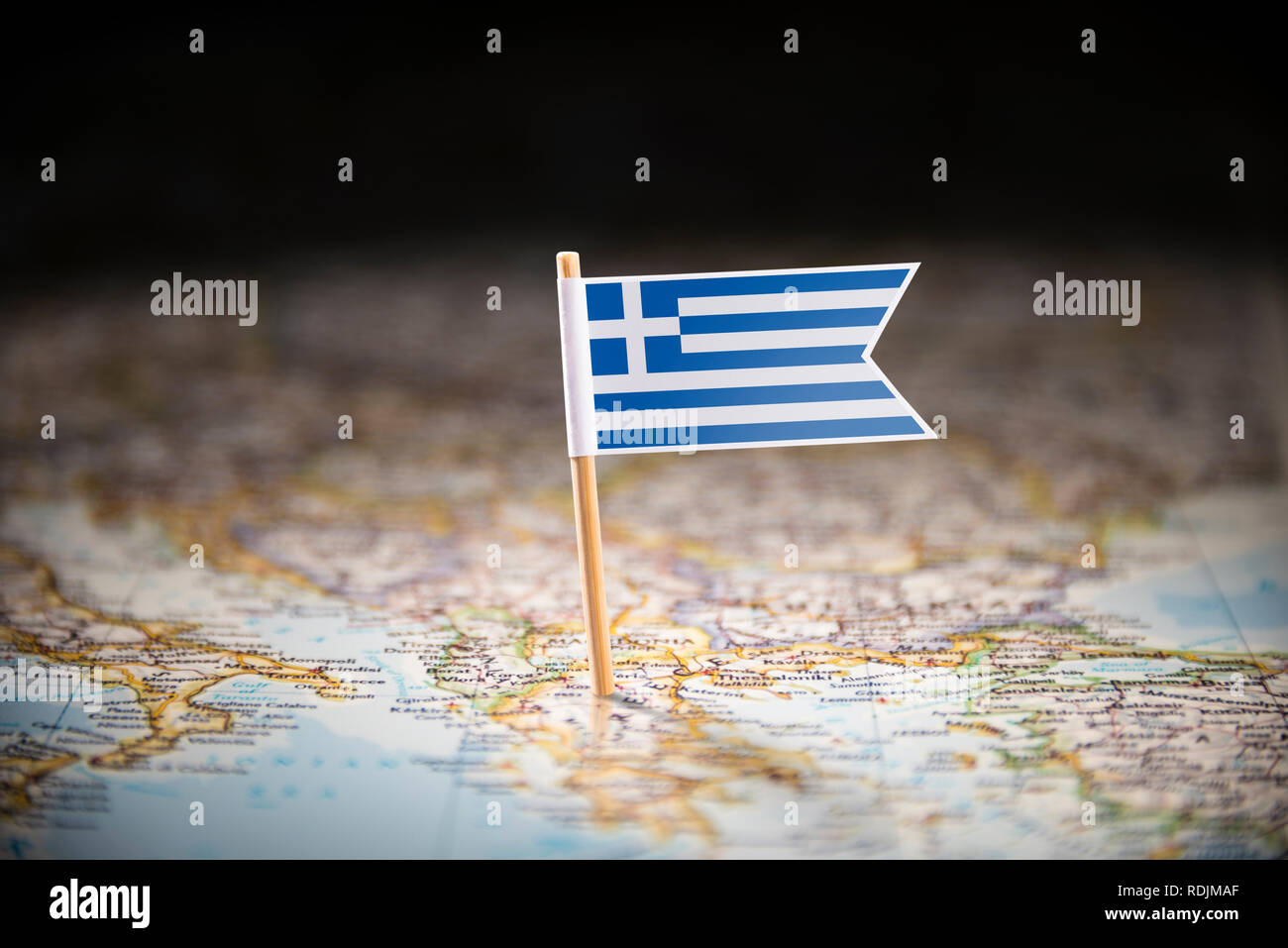Greece marked with a flag on the map Stock Photo - Alamy