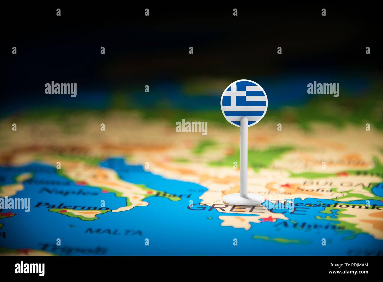 Greece marked with a flag on the map Stock Photo - Alamy